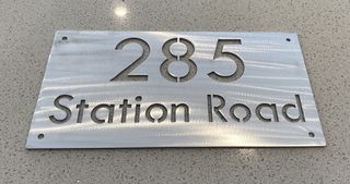 Custom street address numbers and Signs plasma cut from steel